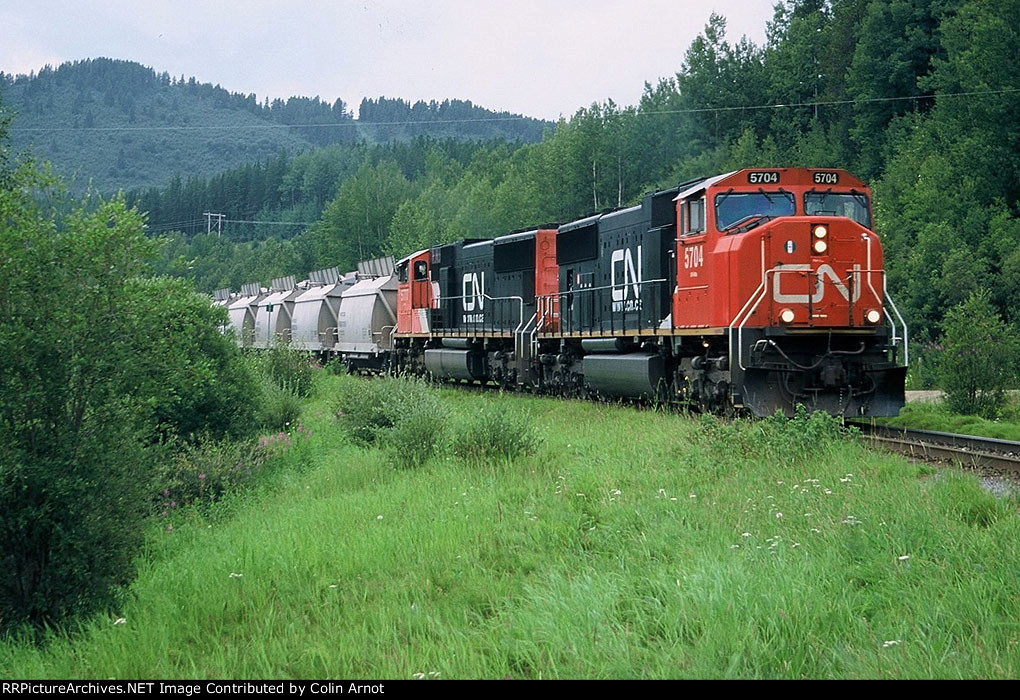 CN 5704 and 5777 approach Robb Tunnel on CN's Foothills Sub